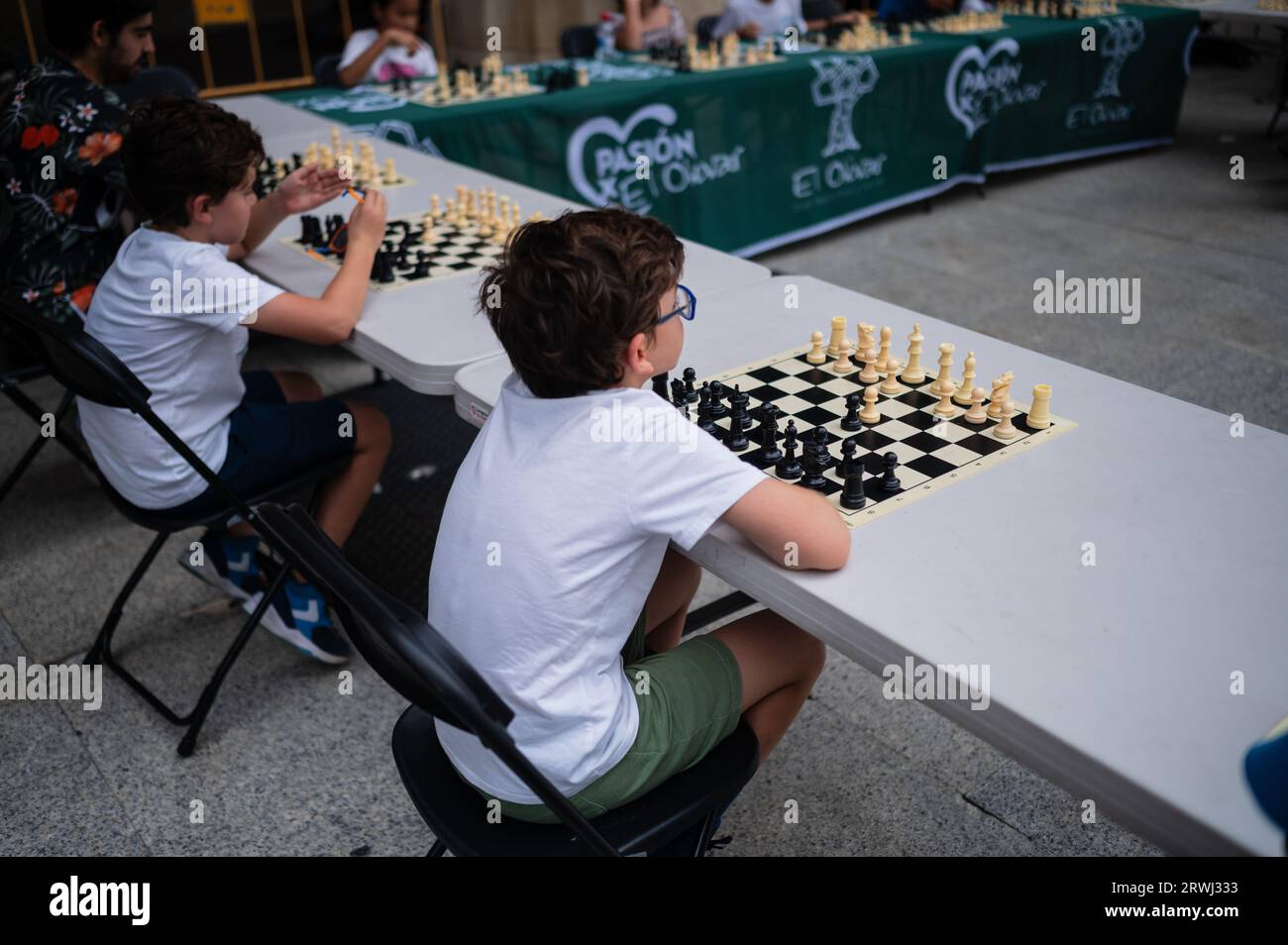 Kids playing chess during Sports Day multi-sports street event in Plaza ...
