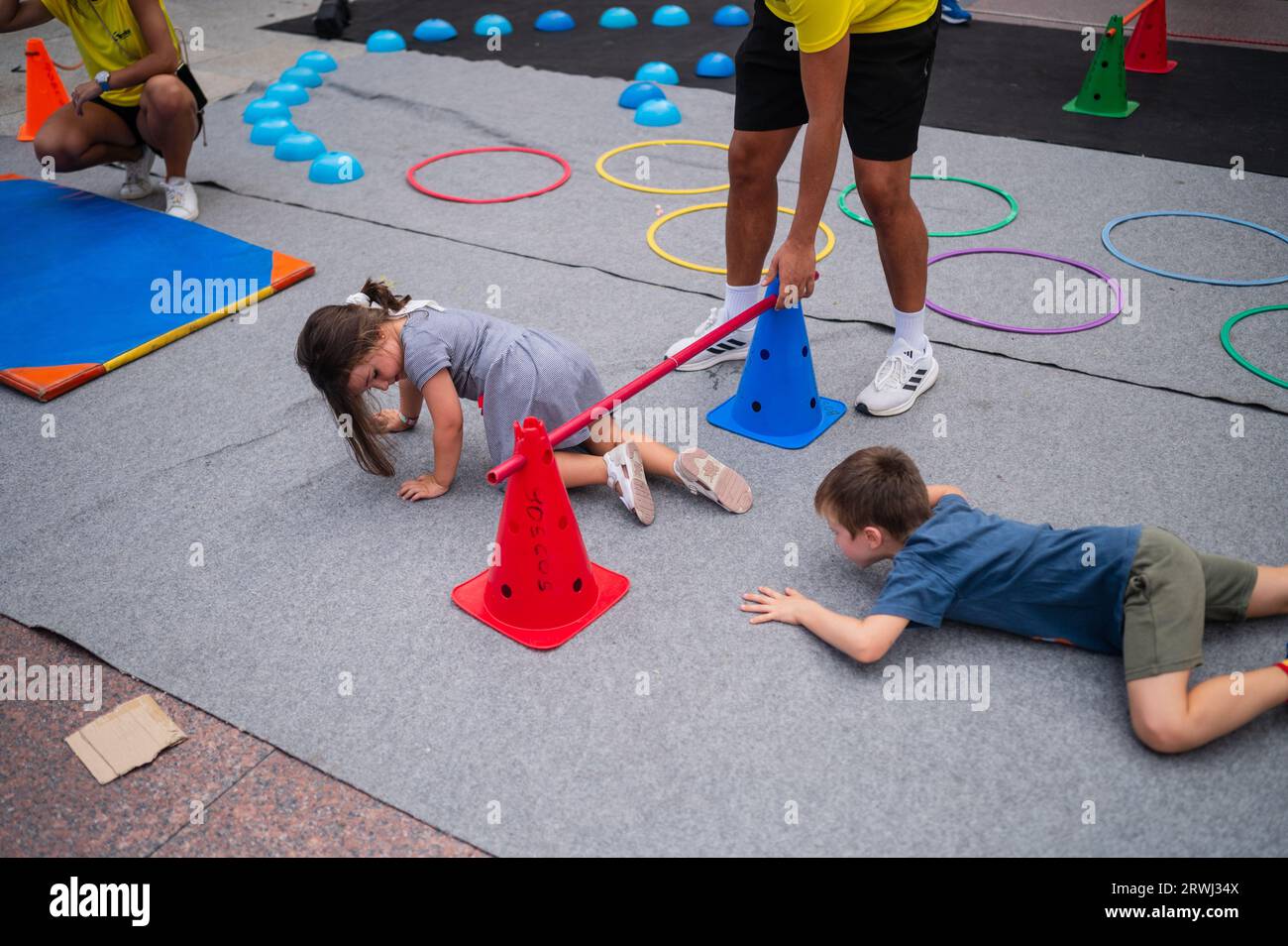 Kids in skills circuit during Sports Day multi-sports street event in ...
