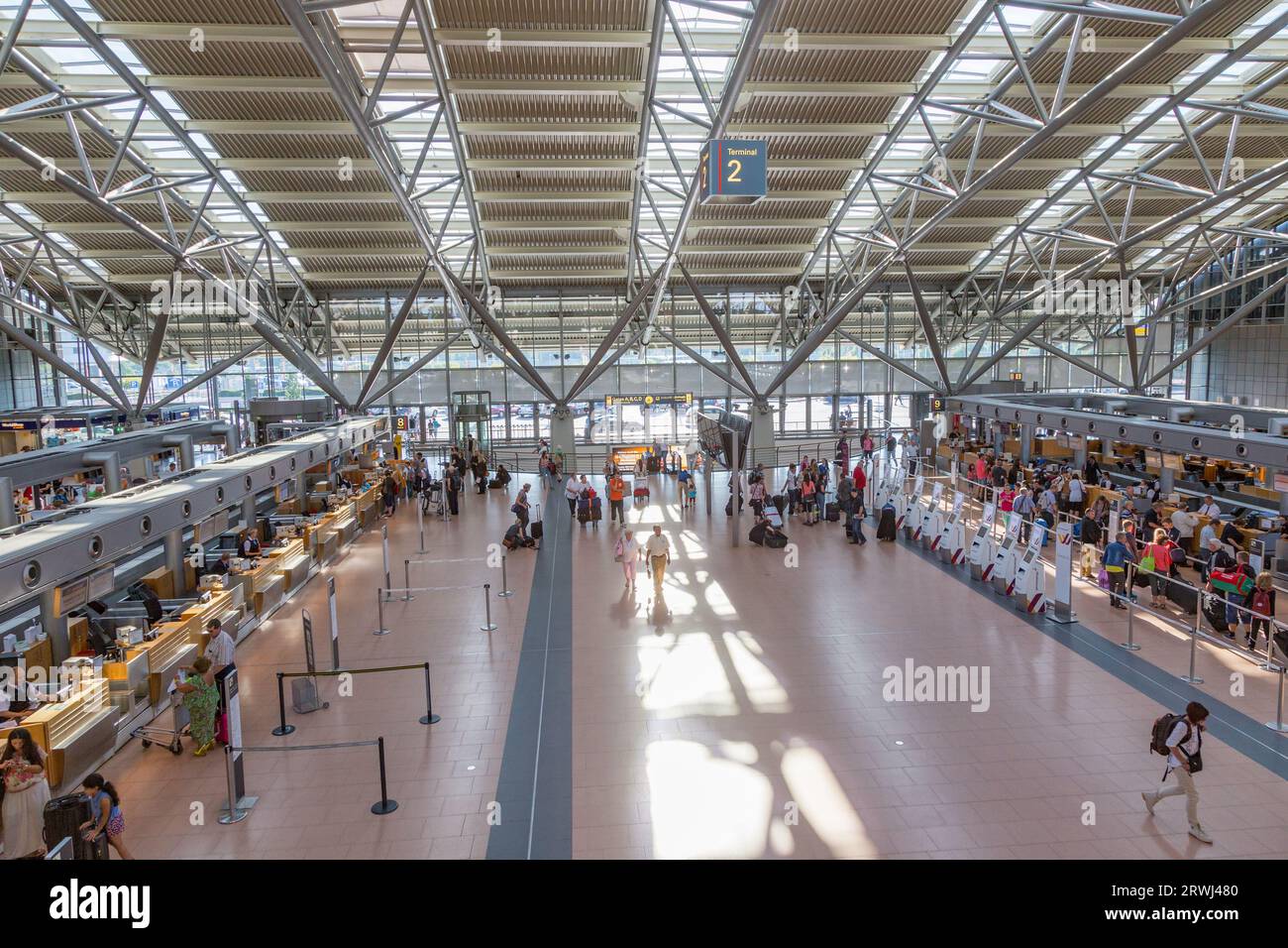 Hamburg, Germany - July 17, 2014: people at the check in and baggage ...