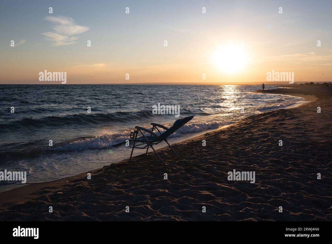 beautiful sunset on a sandy beach near the ocean. great background for ...