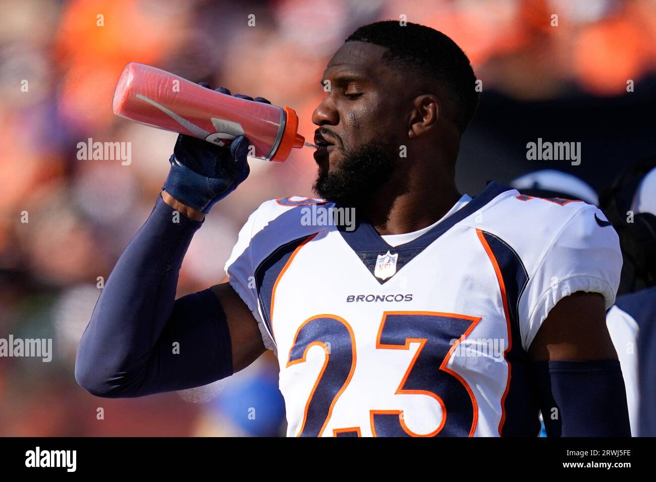 Denver Broncos cornerback Fabian Moreau (23) takes a drink against the ...