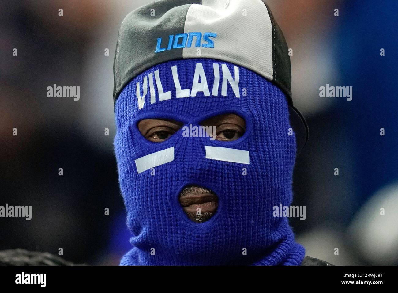 A Detroit Lions fan wears a blue ski mask during the first half of an ...
