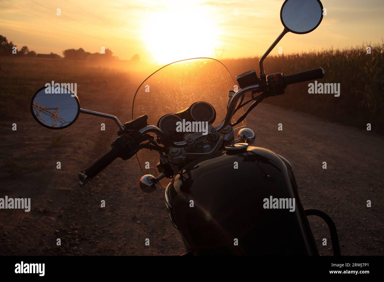 Triumph motorcycle sunset biker perspective Stock Photo - Alamy