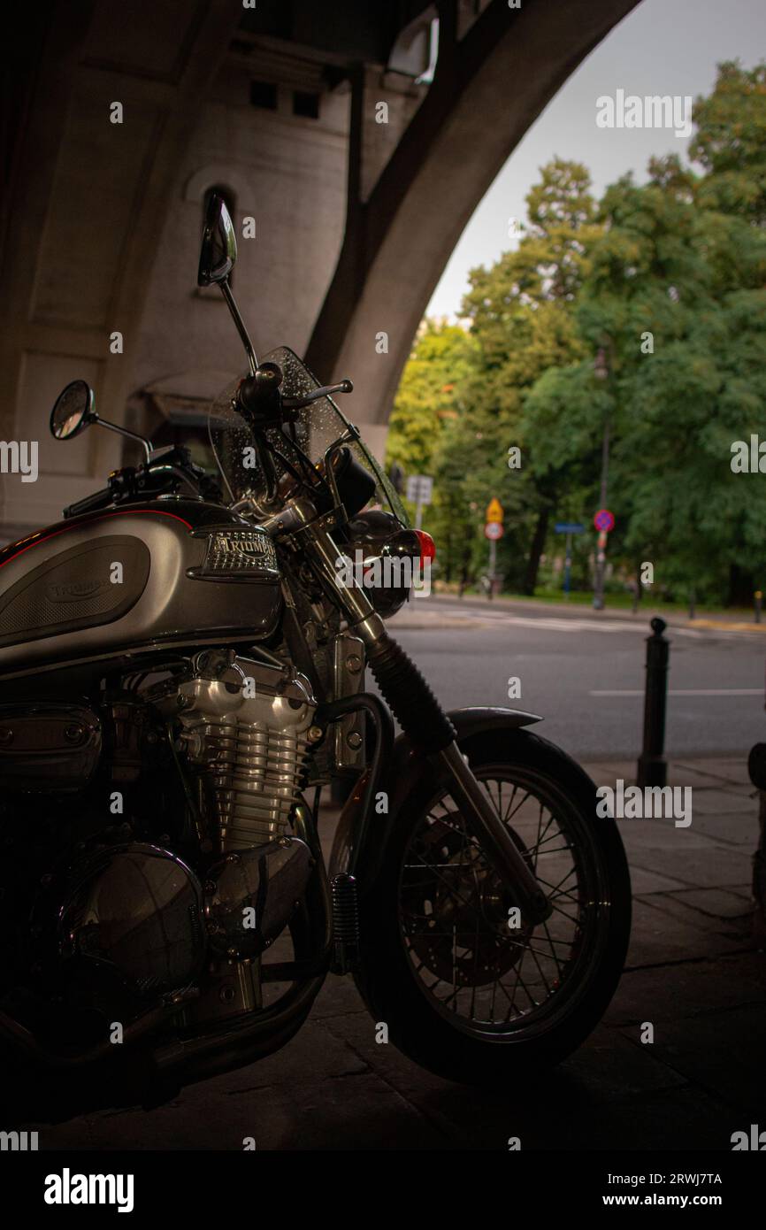 Triumph motorcycle city Stock Photo - Alamy