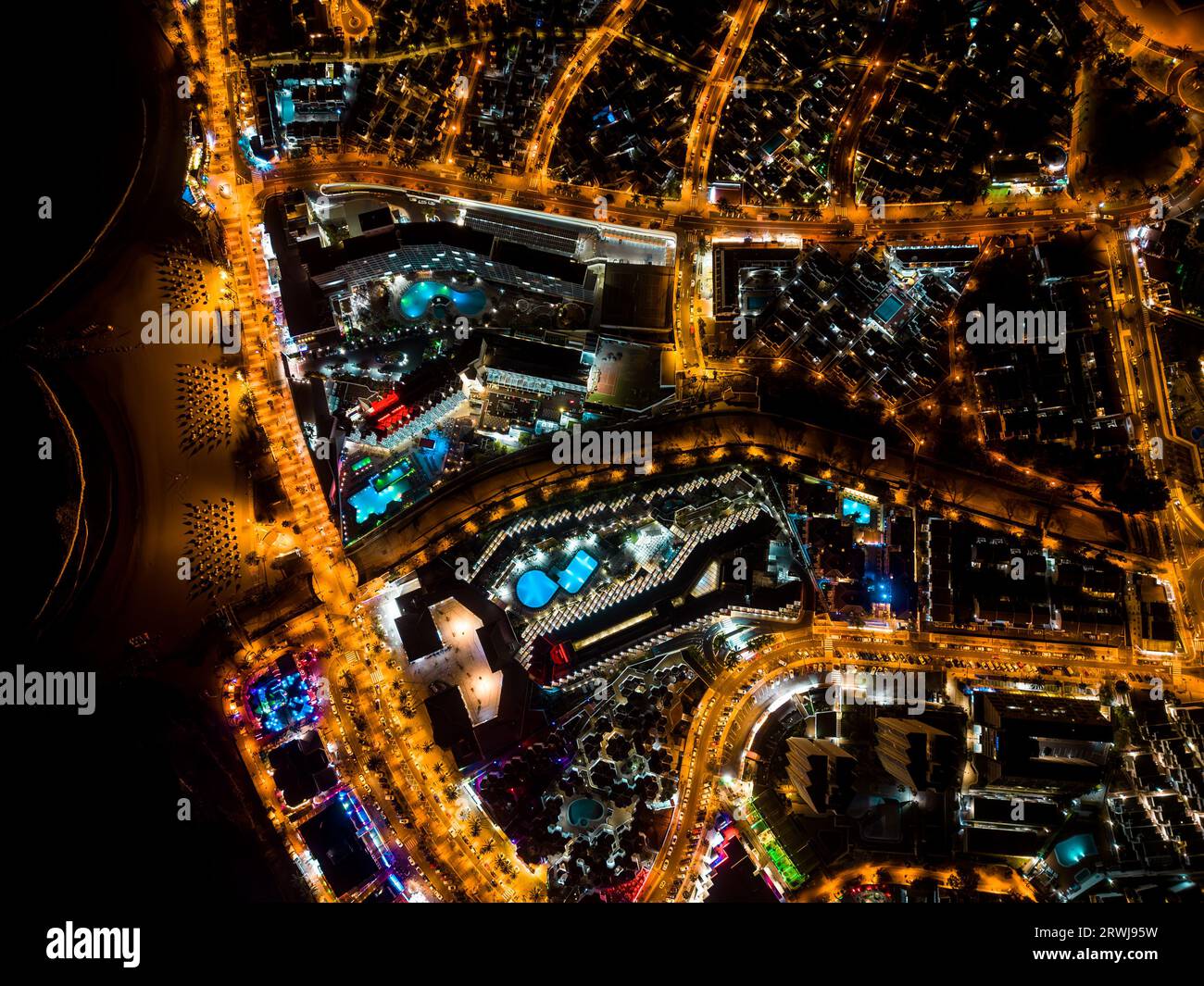 aerial view of illuminated light night city with coast, Tenerife ...