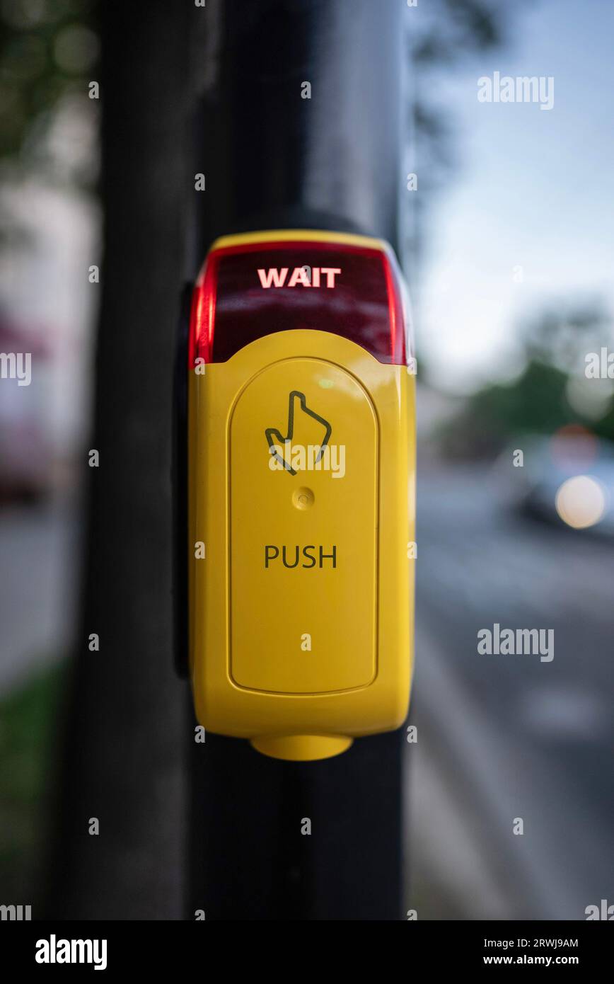 traffic light button with red light and wait stop signal, yellow box ...