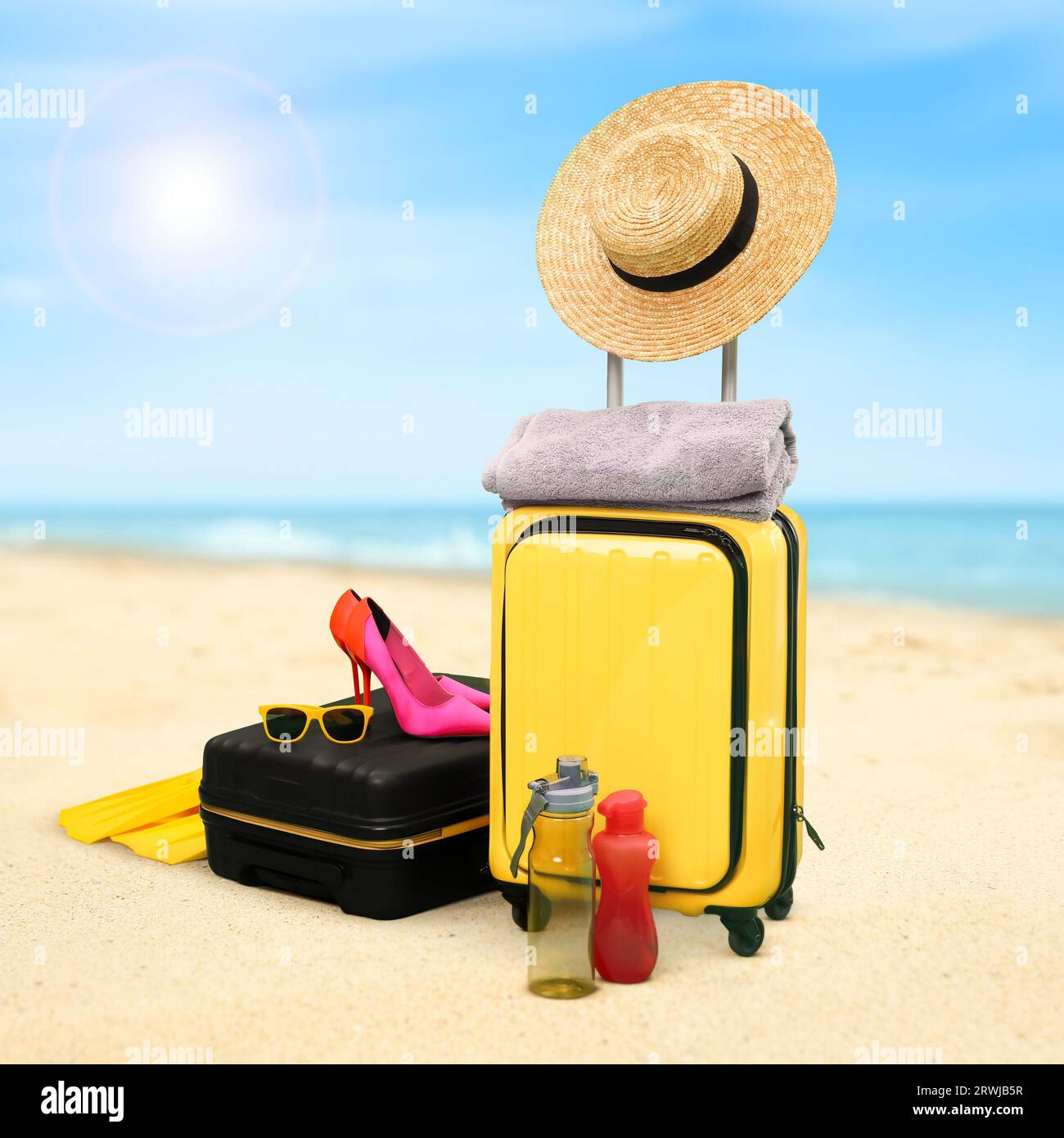 Suitcases on beach sand hi-res stock photography and images - Alamy