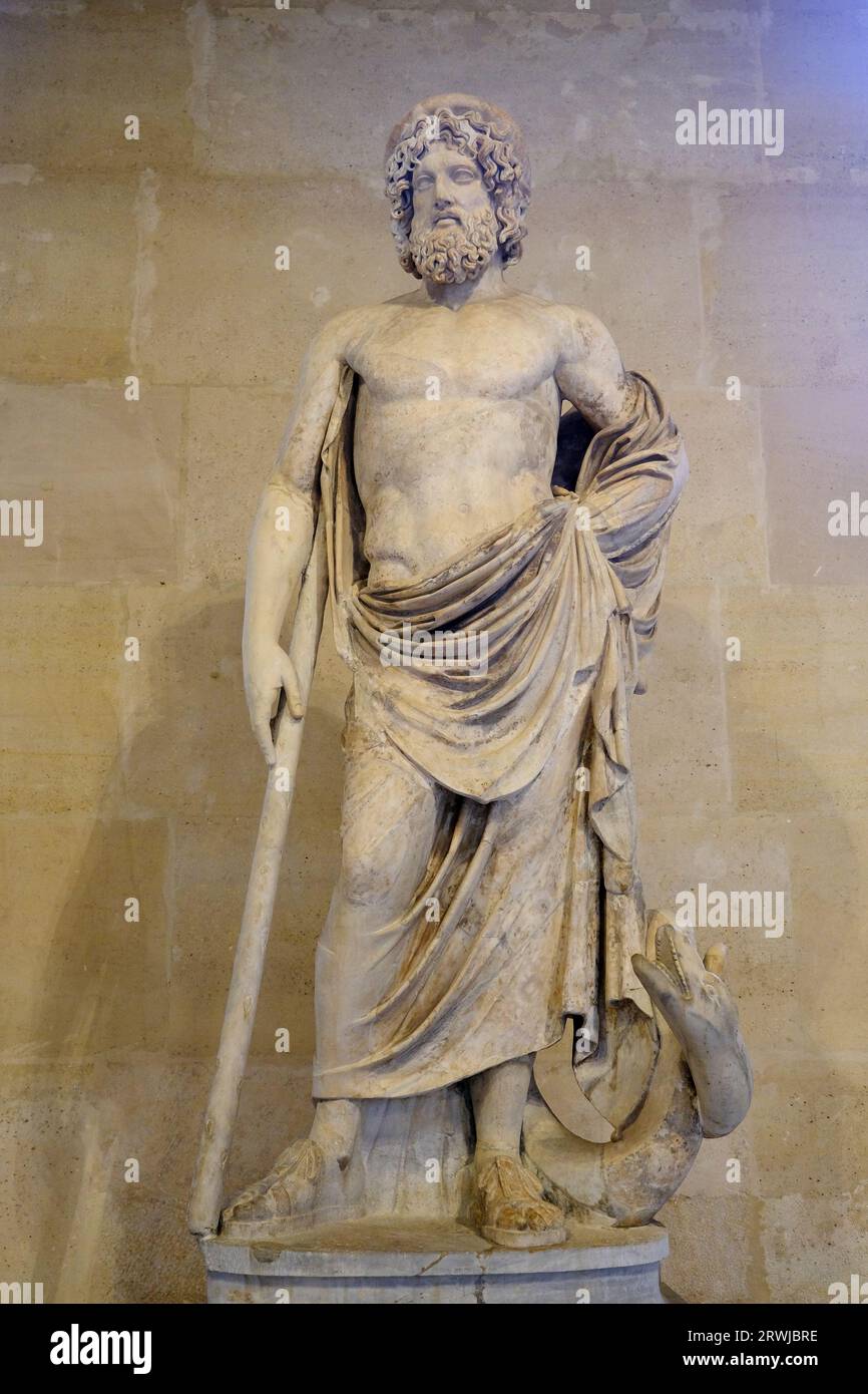 Statue of Aesculapius the Roman God of Medicine standing in the Louvre ... Statue of Aesculapius the Roman God of Medicine standing in the Louvre ...