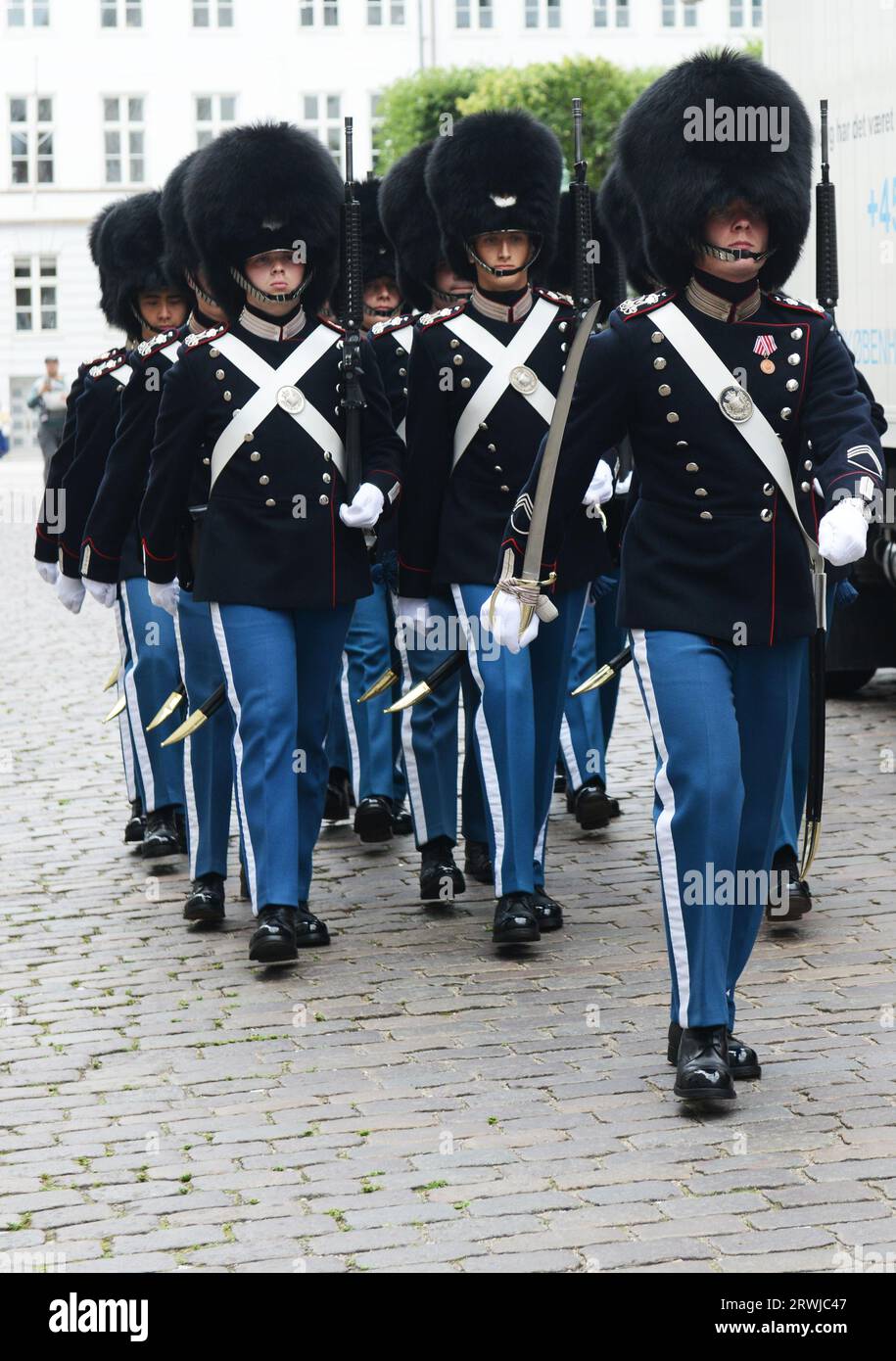 Royal Danish guards marching towards the Amalienborg castle in ...