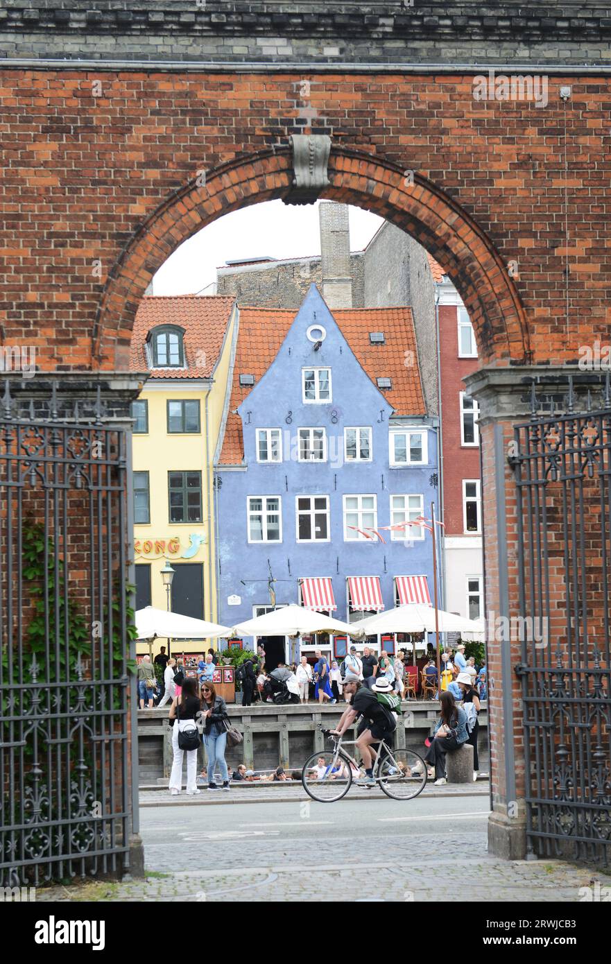 The colorful buildings at Nyhavn seen through the gate of the Kunsthal ...