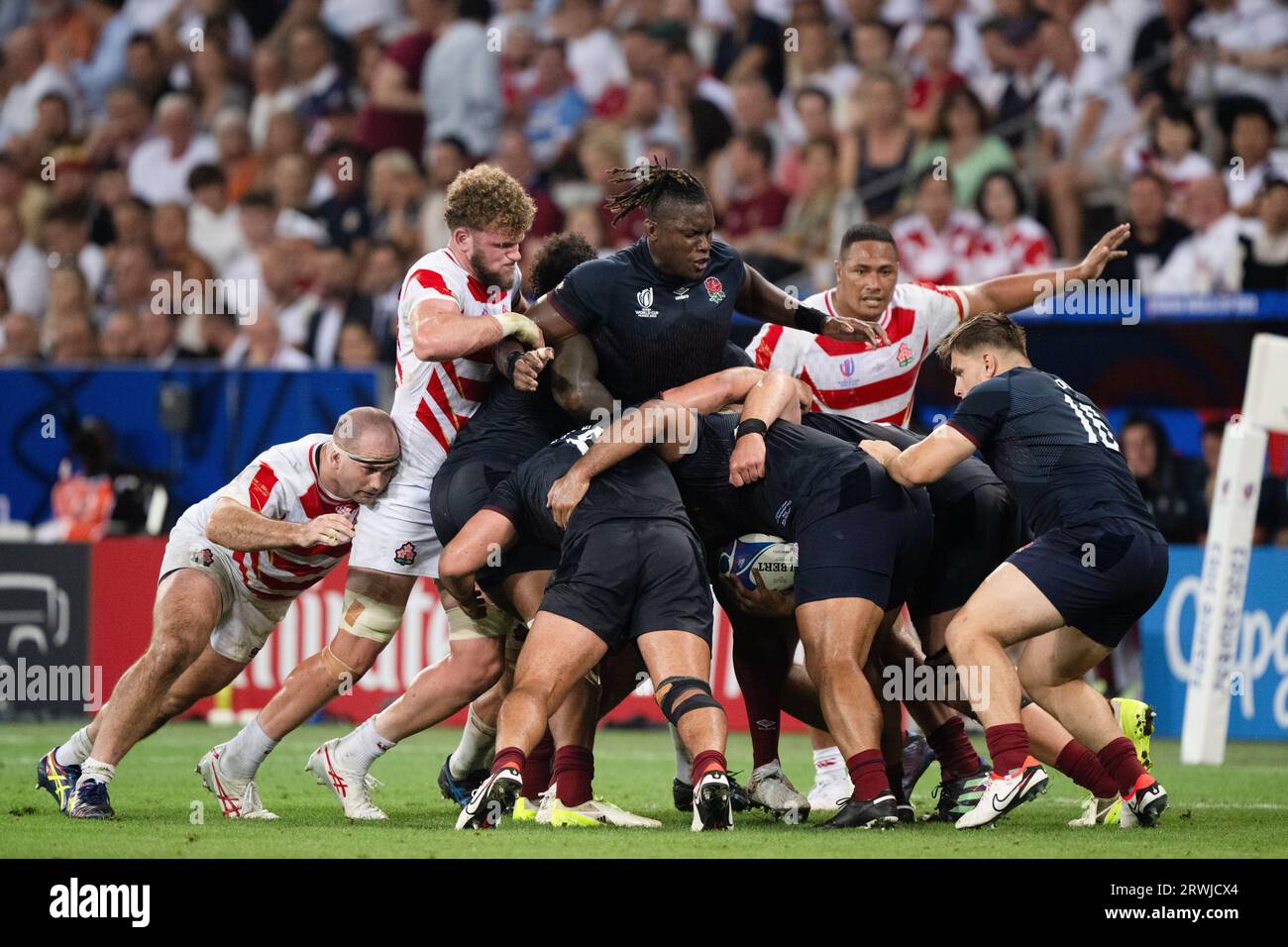 (L-R) Japan's Craig Millar, Warner Dearns and England's Maro Itoje ...