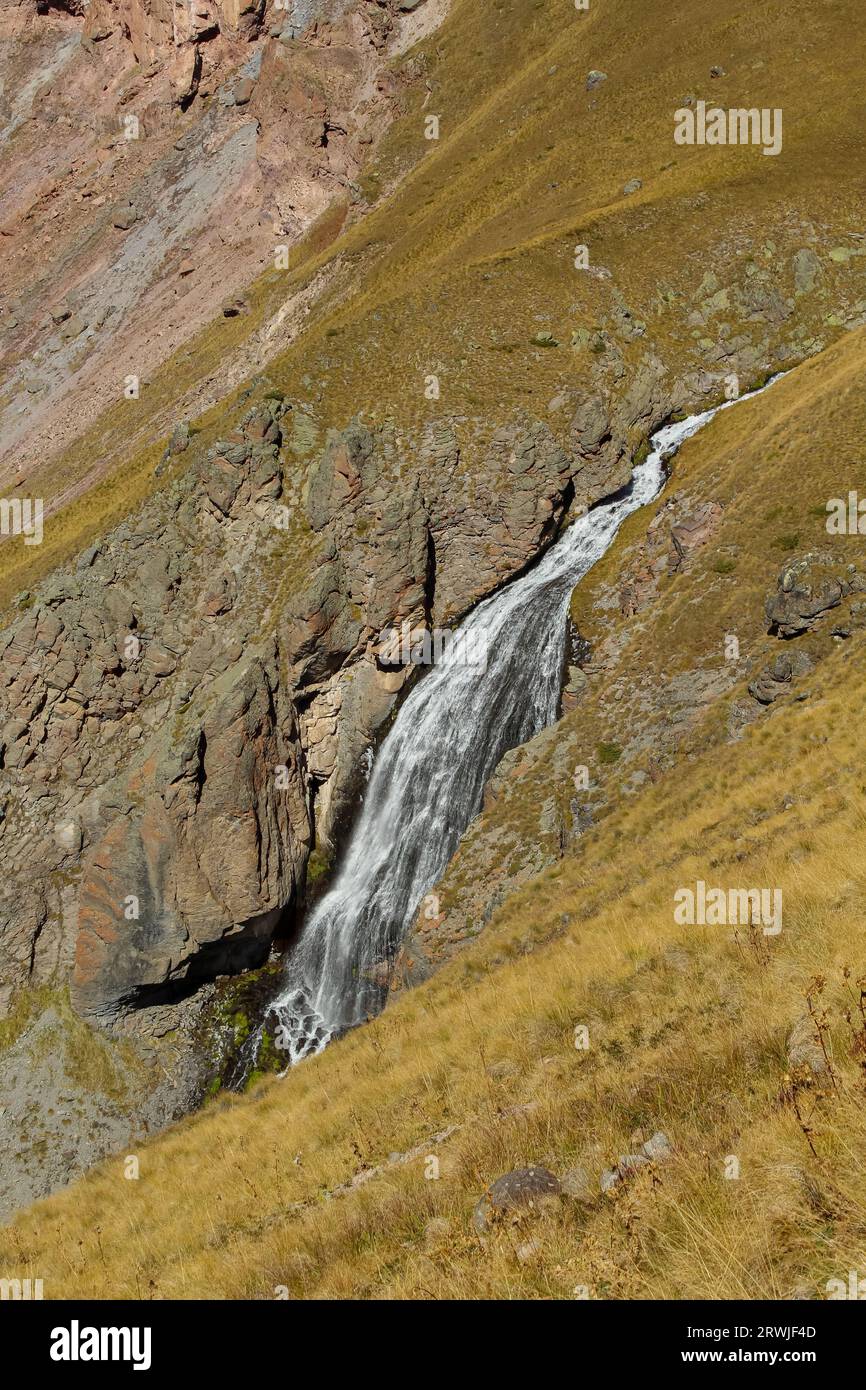 Vertical background image of the Maiden's tears waterfall in Elbrus ...