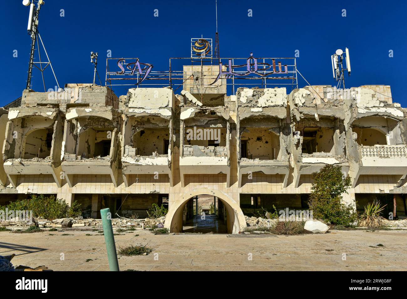 Ruins of Safir Hotel (bombed out in civil war) in Maaloula, an Aramaic ...