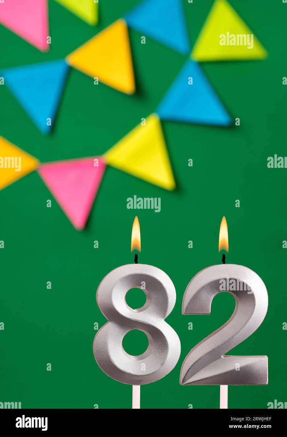 Vertical birthday card with number 82 candle - Green background with ...