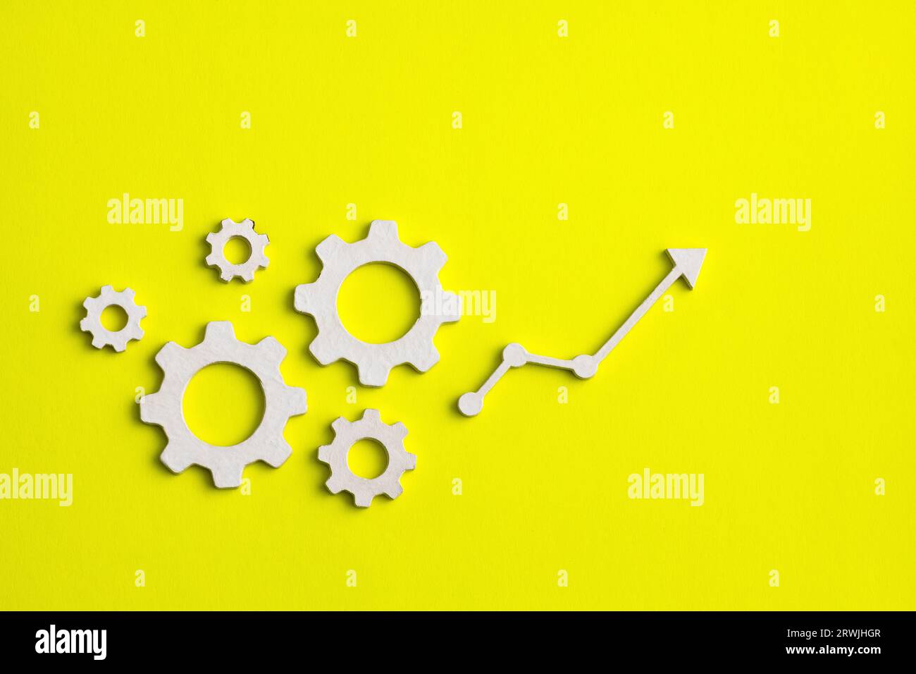 Business growth - Business process automation. gears on yellow ...
