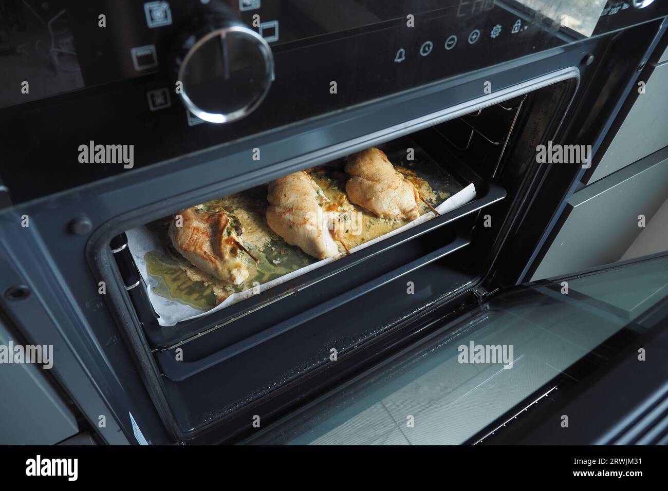 Baked chicken in open hi-res stock photography and images - Alamy