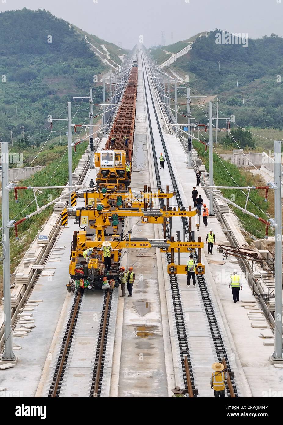 YANTAI, CHINA - SEPTEMBER 19, 2023 - A track-laying train performs ...