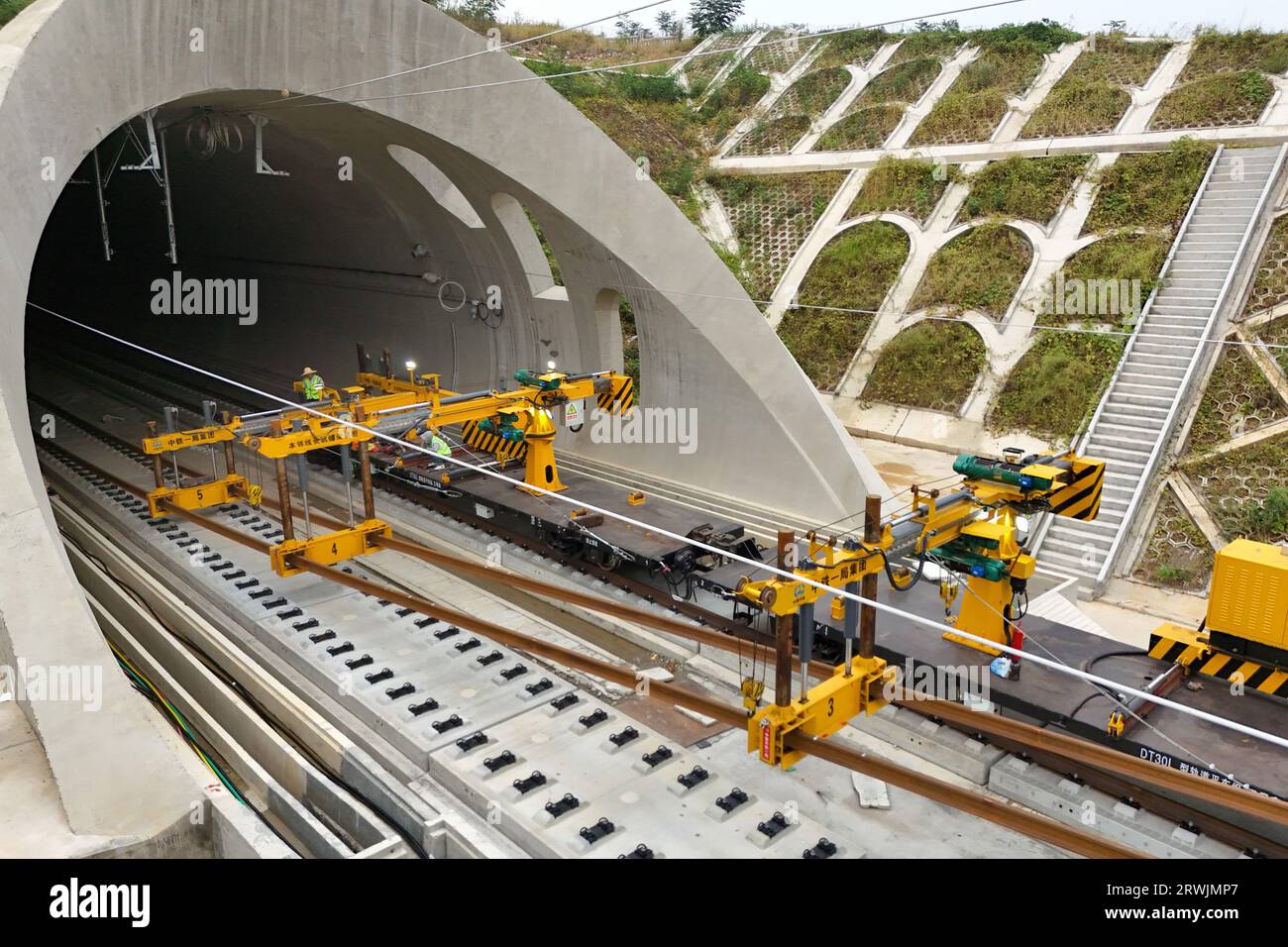YANTAI, CHINA - SEPTEMBER 19, 2023 - A track-laying train performs ...