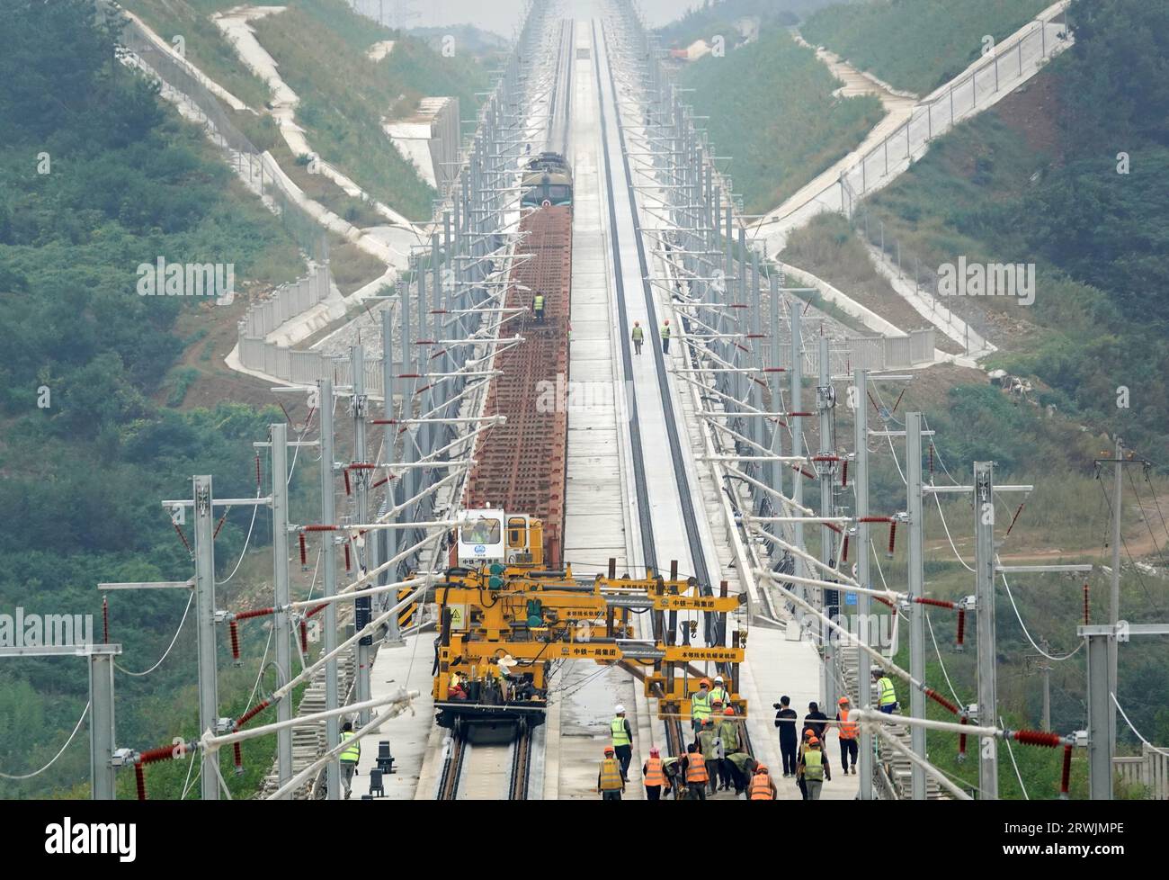 YANTAI, CHINA - SEPTEMBER 19, 2023 - A track-laying train performs ...