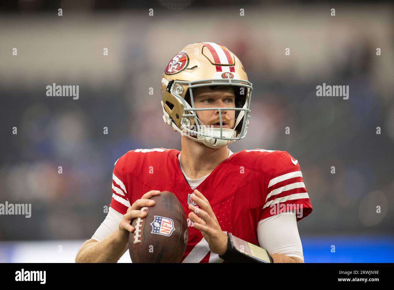 San Francisco 49ers quarterback Sam Darnold (14) throws a pass before ...