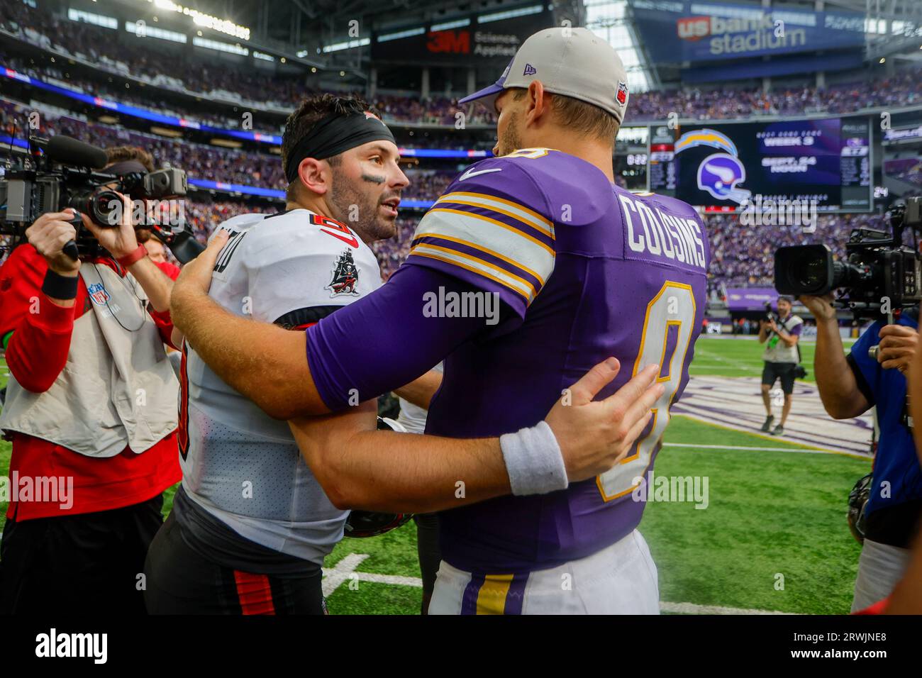 Tampa Bay Buccaneers quarterback Baker Mayfield (6) talks with Minnesota Vikings quarterback ...
