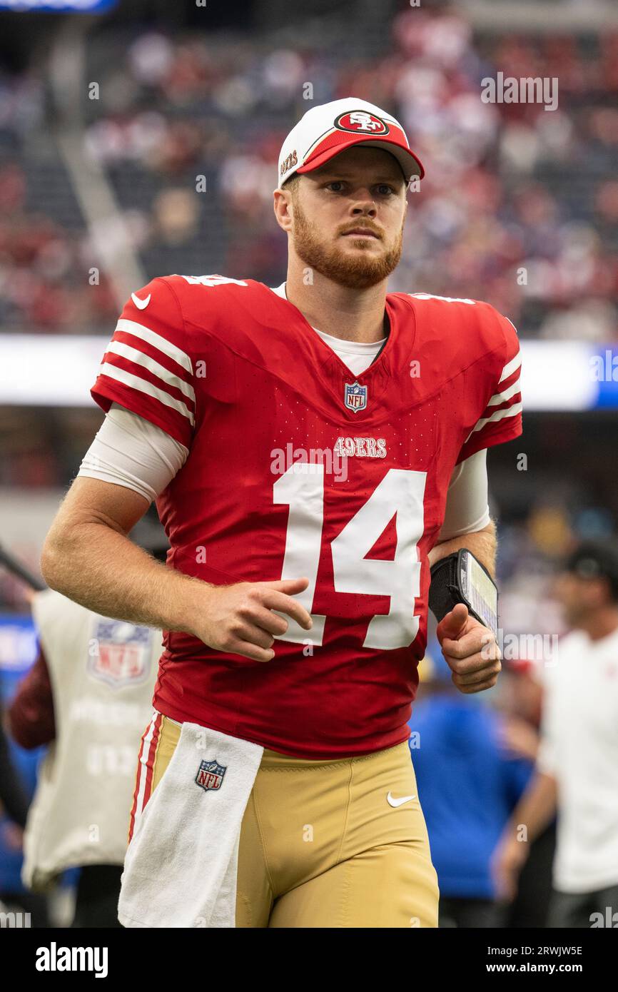San Francisco 49ers quarterback Sam Darnold (14) jogs back to the ...