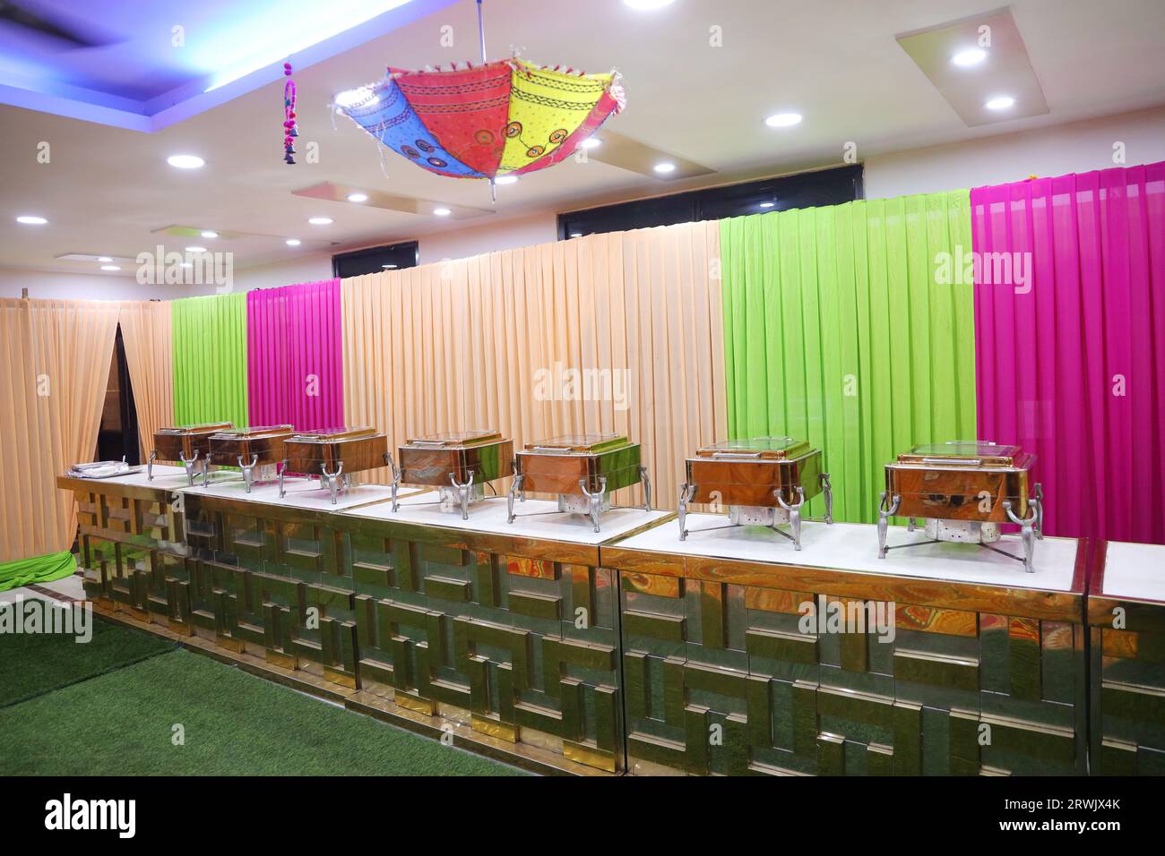 Closed buffet stall at indoor indian function Stock Photo - Alamy