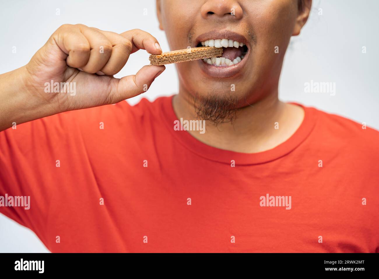 Man eating chocolate hi-res stock photography and images - Alamy
