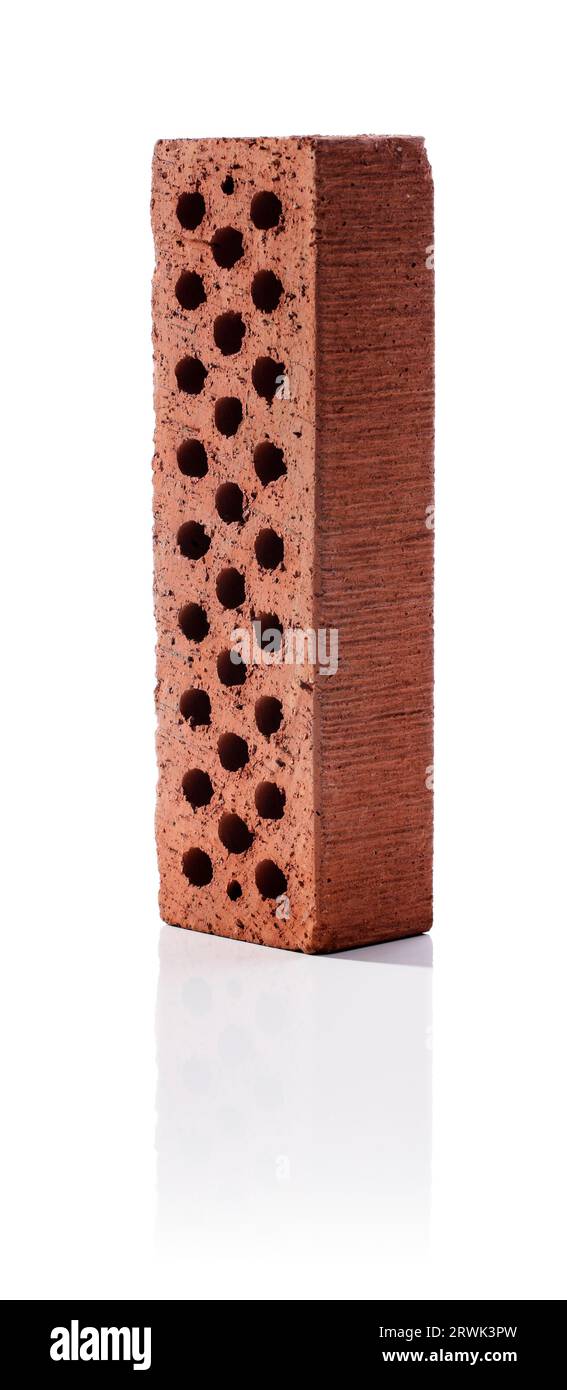 Perforated brick on white reflecting background Stock Photo - Alamy