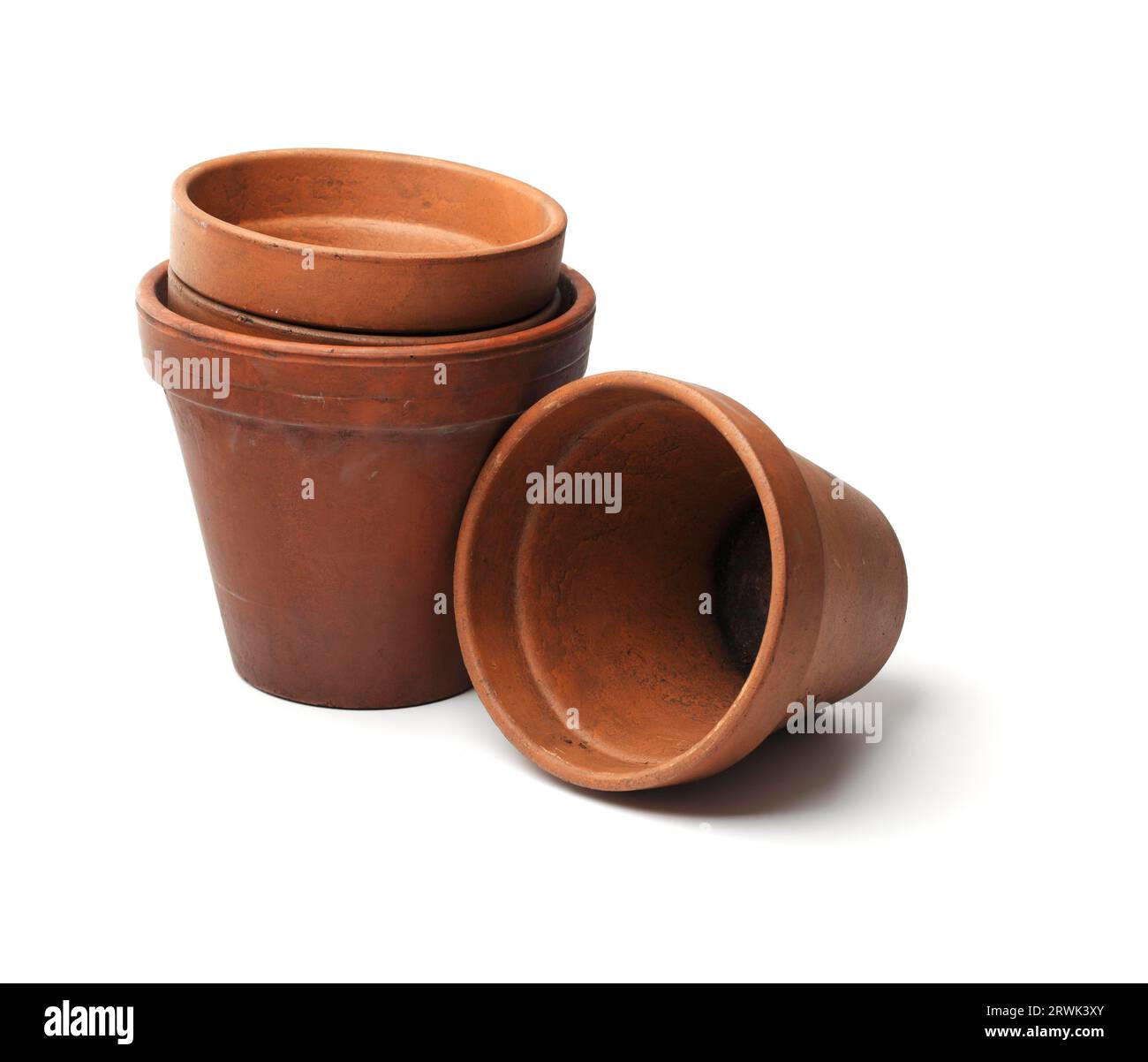 Old clay pots used in gardening isolated on white with natural shadow ...