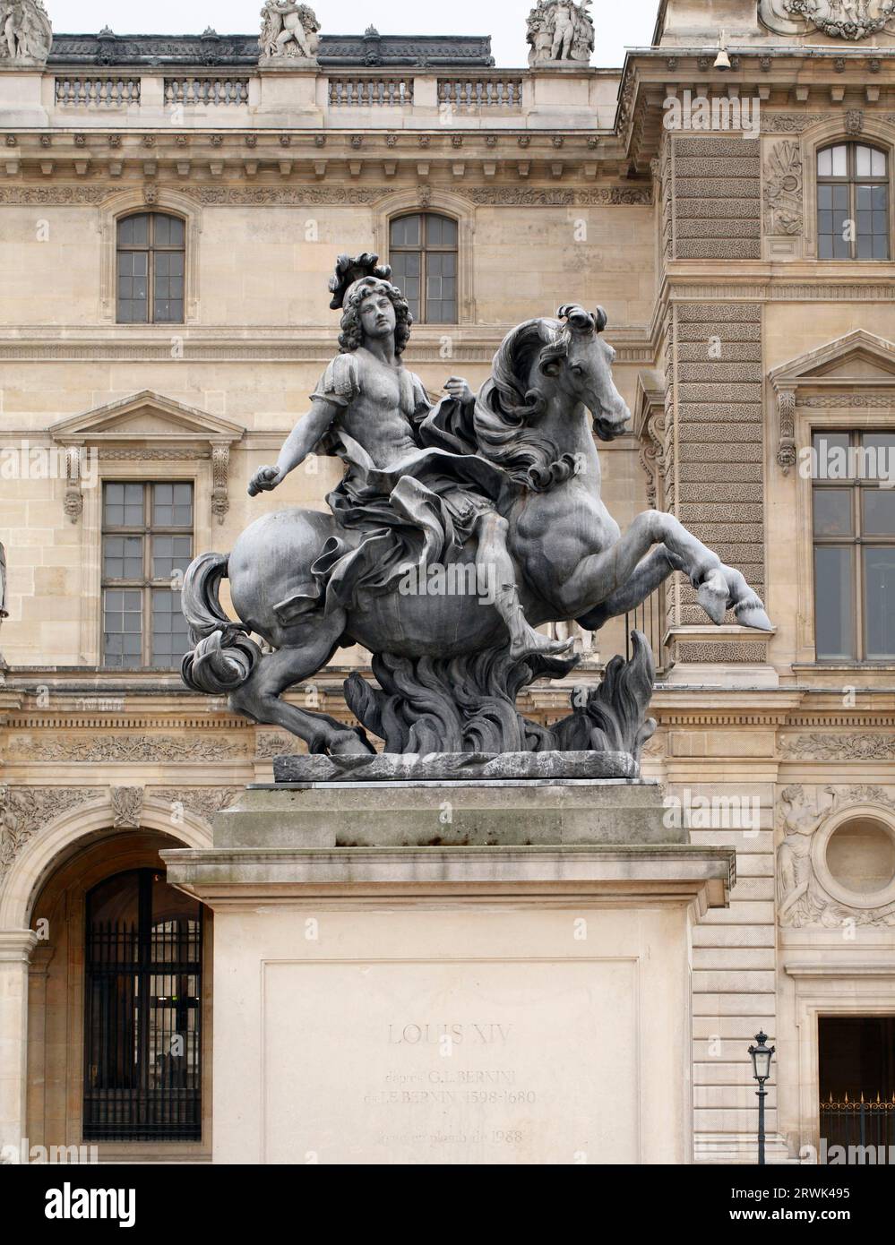 Equestrian statue of king Louis XIV in the courtyard of the Louvre ...
