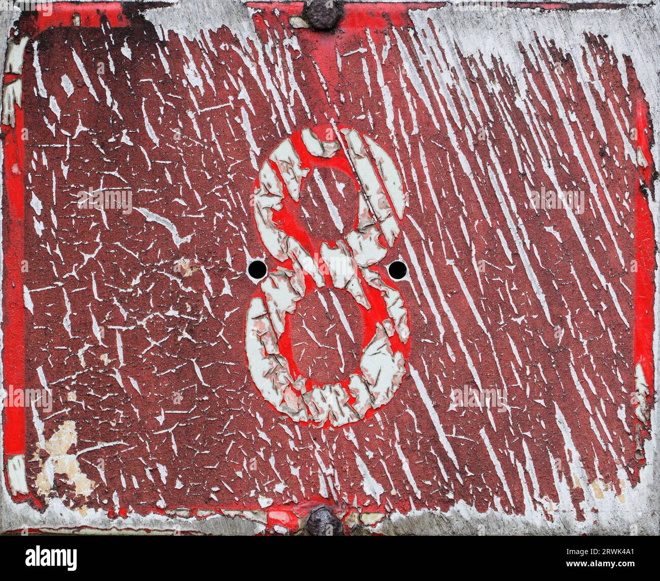 Old worn and weathered sign with number 8.§ Stock Photo - Alamy