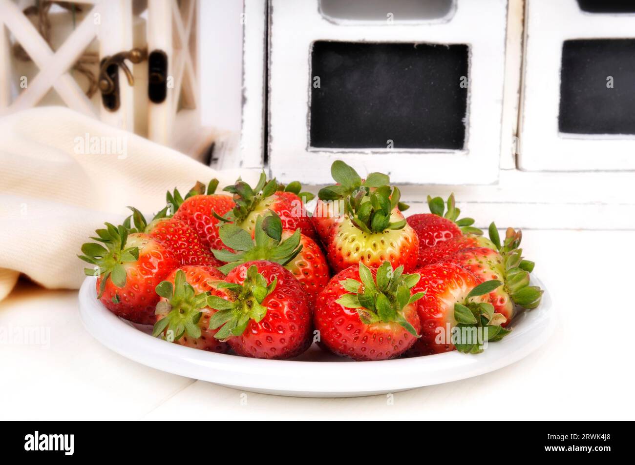 Strawberries in country style Stock Photo - Alamy