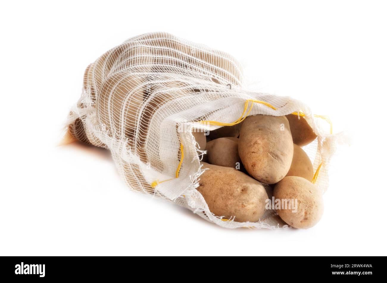 Potatoes in a sack Stock Photo - Alamy