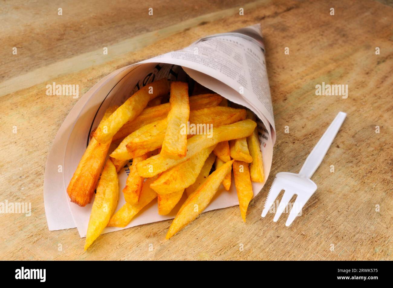 Homemade fries in a newspaper bag Stock Photo - Alamy