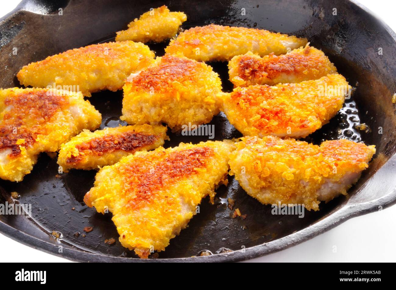 Chicken nuggets in the pan Stock Photo - Alamy