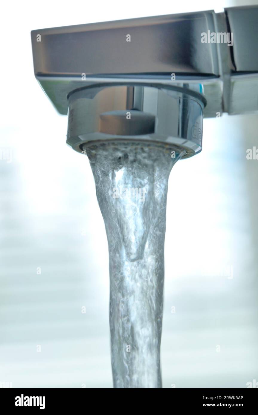Drinking water tap tap flows hi-res stock photography and images - Alamy