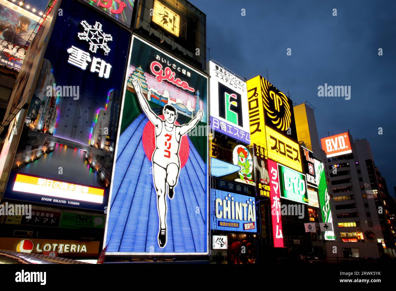 The Glico Running Man over the Dotonbori canal Stock Photo - Alamy