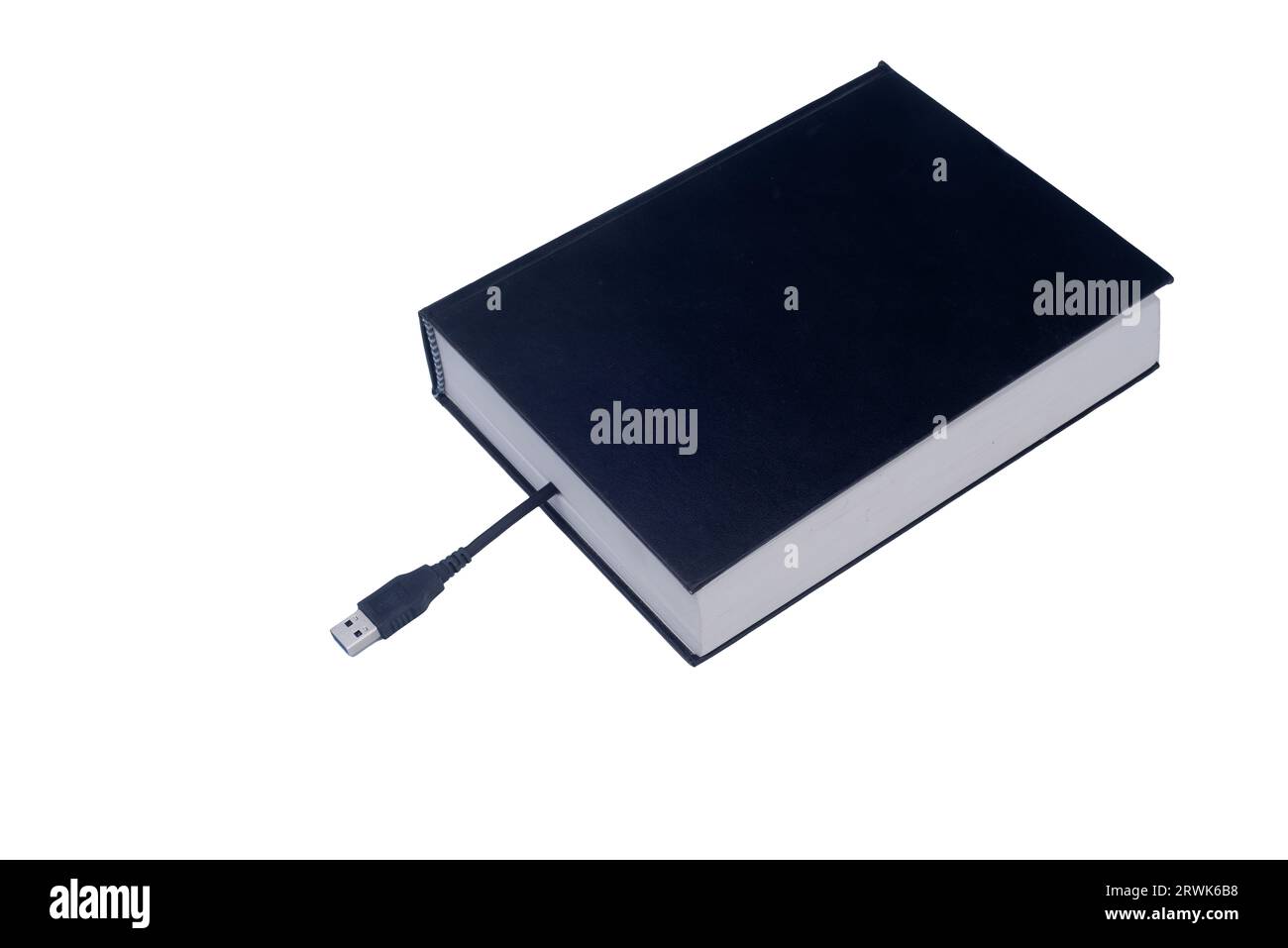 a book with a USB plug coming out of its pages on a transparent ...