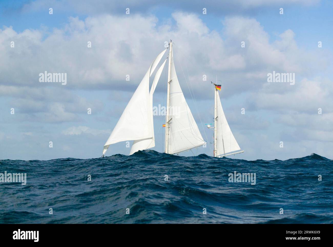 Yacht in high seas Stock Photo - Alamy