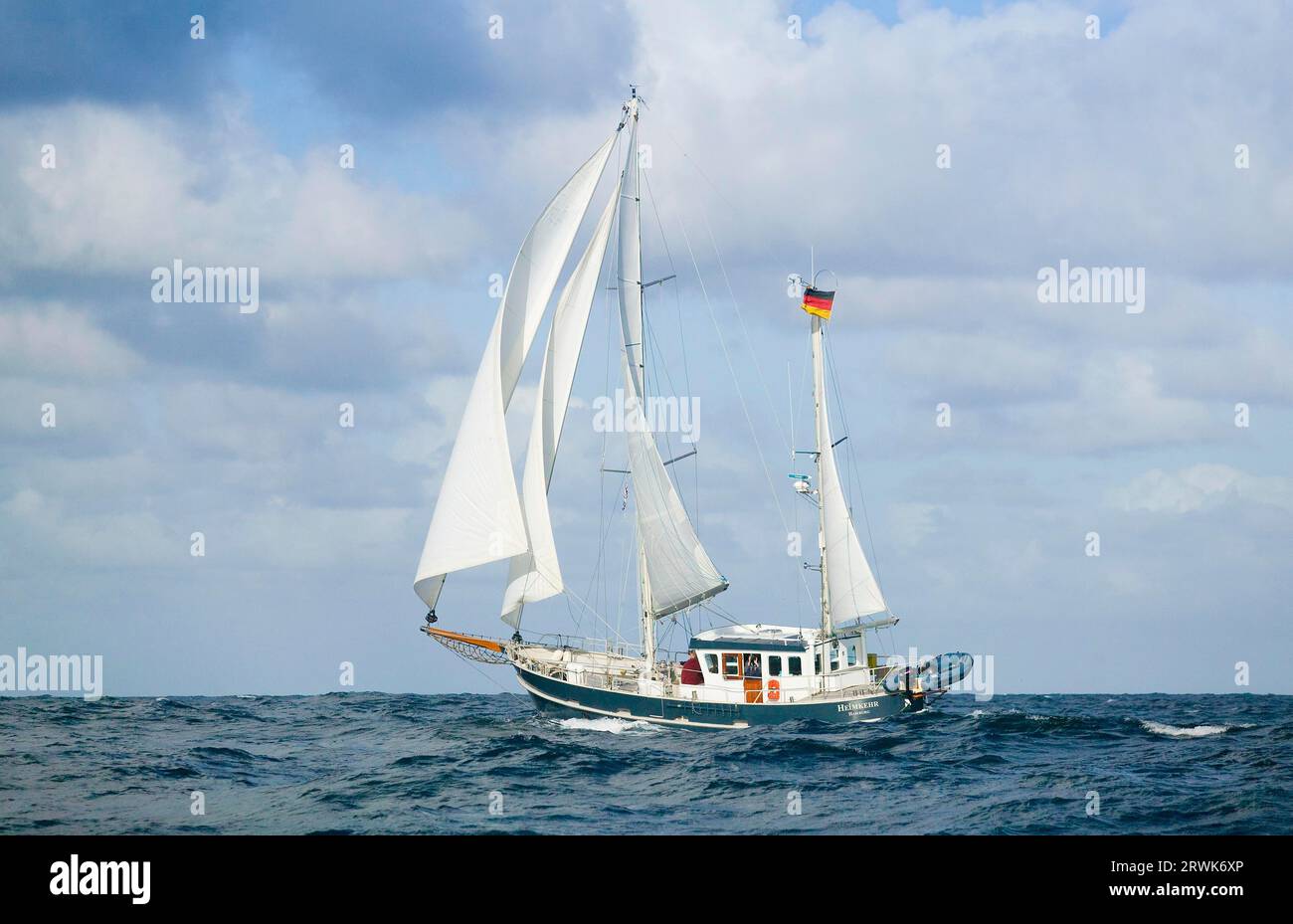 Yacht in high seas Stock Photo - Alamy