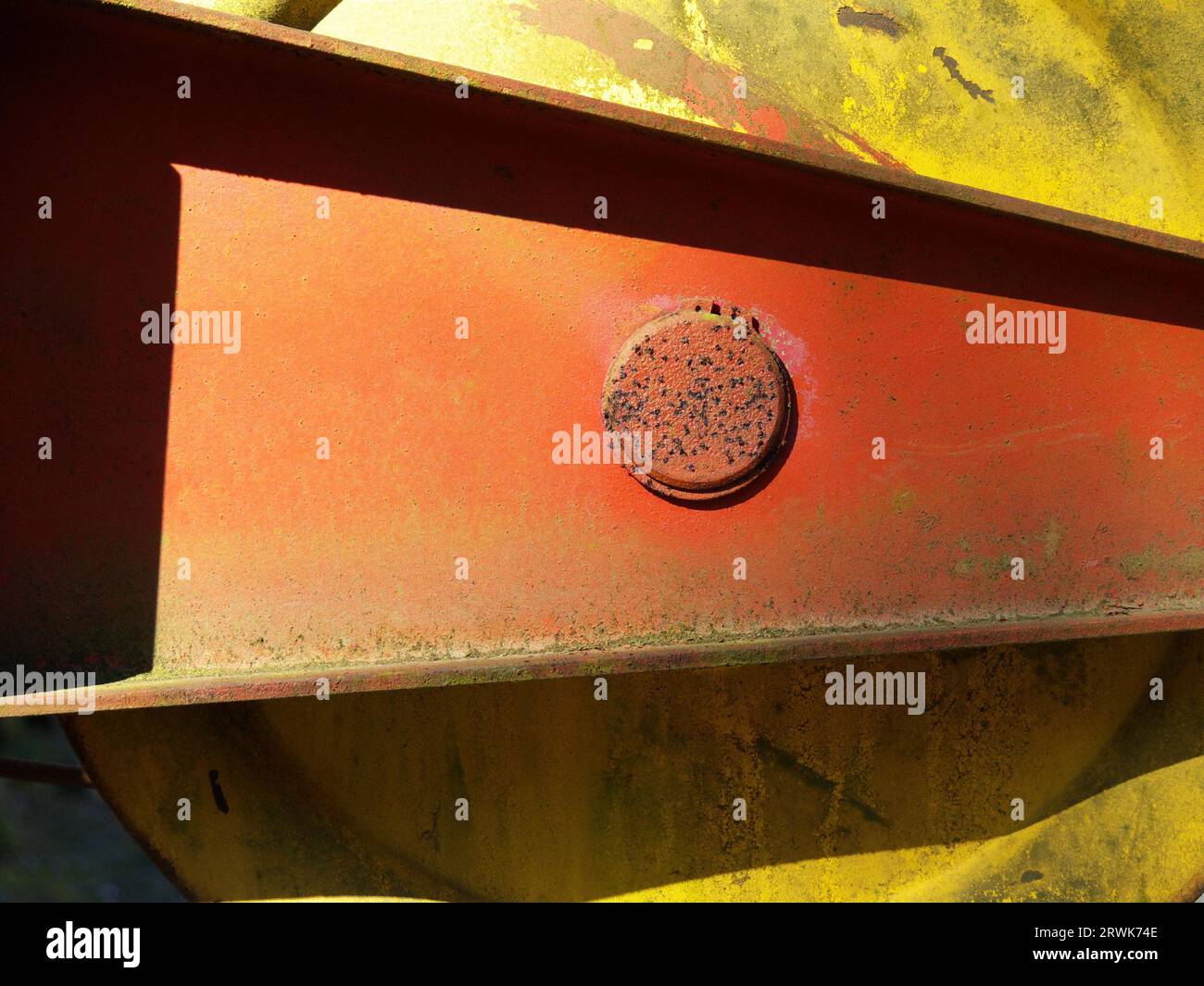 Rope sheave of a crane, sunlit and shaded Stock Photo - Alamy