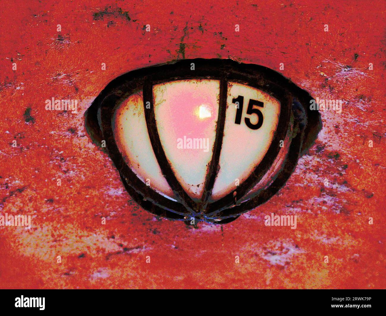 Ceiling light in a vault with the number 15, alienated Stock Photo - Alamy