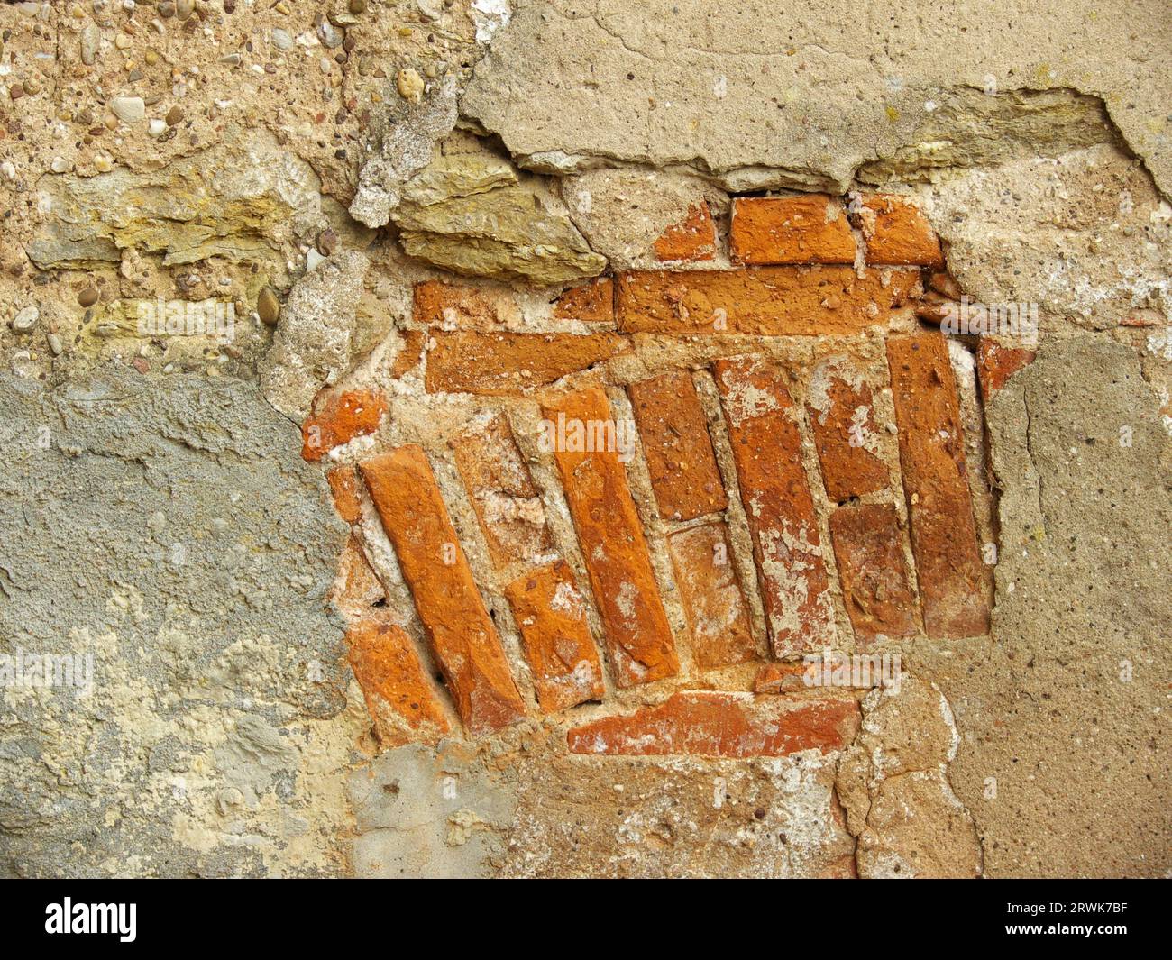 Remains of various building structures on a house wall, detail Stock ...