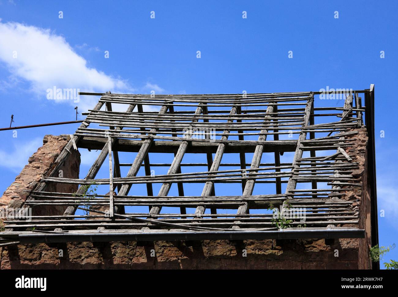 Broken wooden roof, background blue sky with white clouds Stock Photo ...