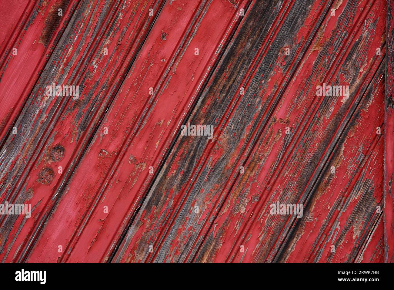Formerly a wooden gate painted in a fallow red with wooden slats ...