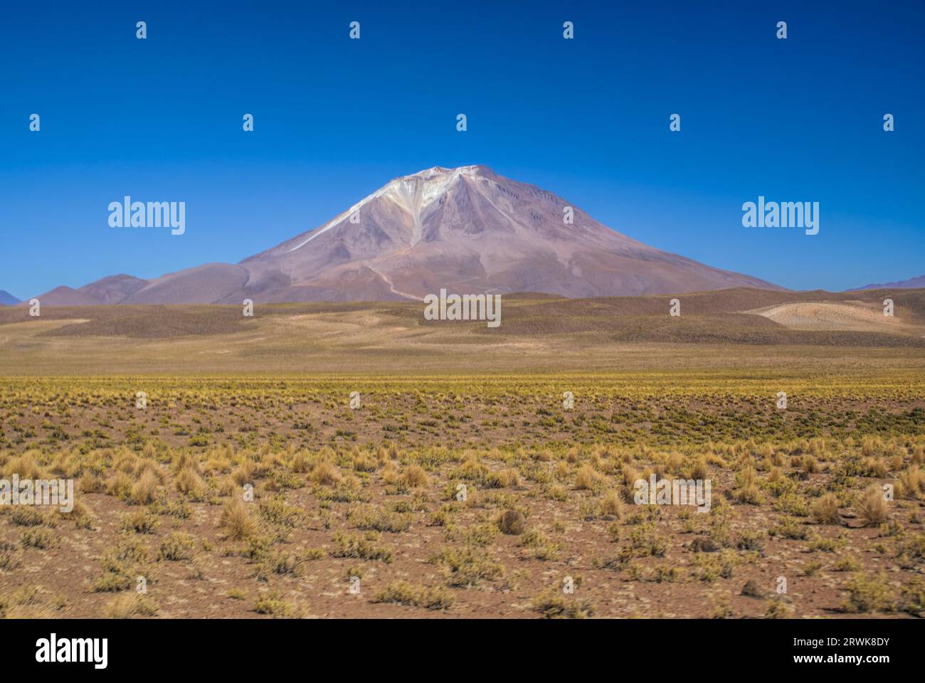 Scenic volcano near salt planes Salar de Uyuni in bolivian desert Stock ...