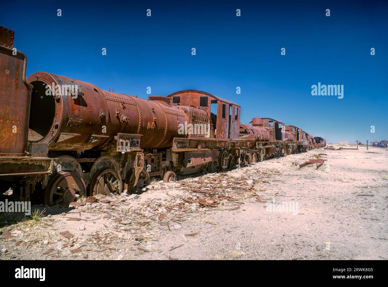 Old locomotive graveyard in desert near Salar de Uyuni in Bolivia Stock ...