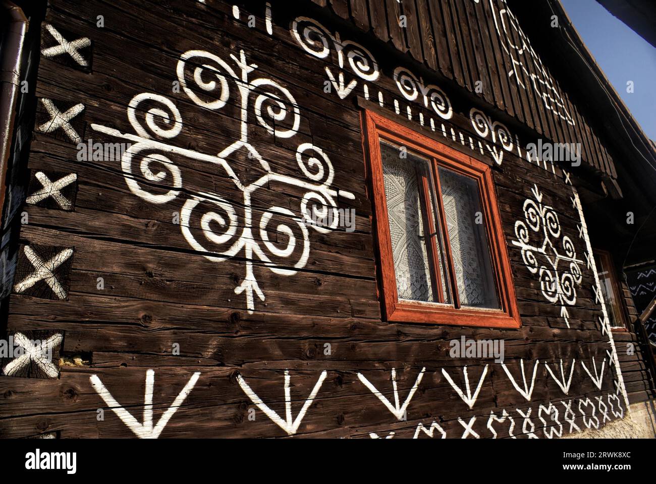 Painted facade of traditional wooden house in Slovakia in famous ...