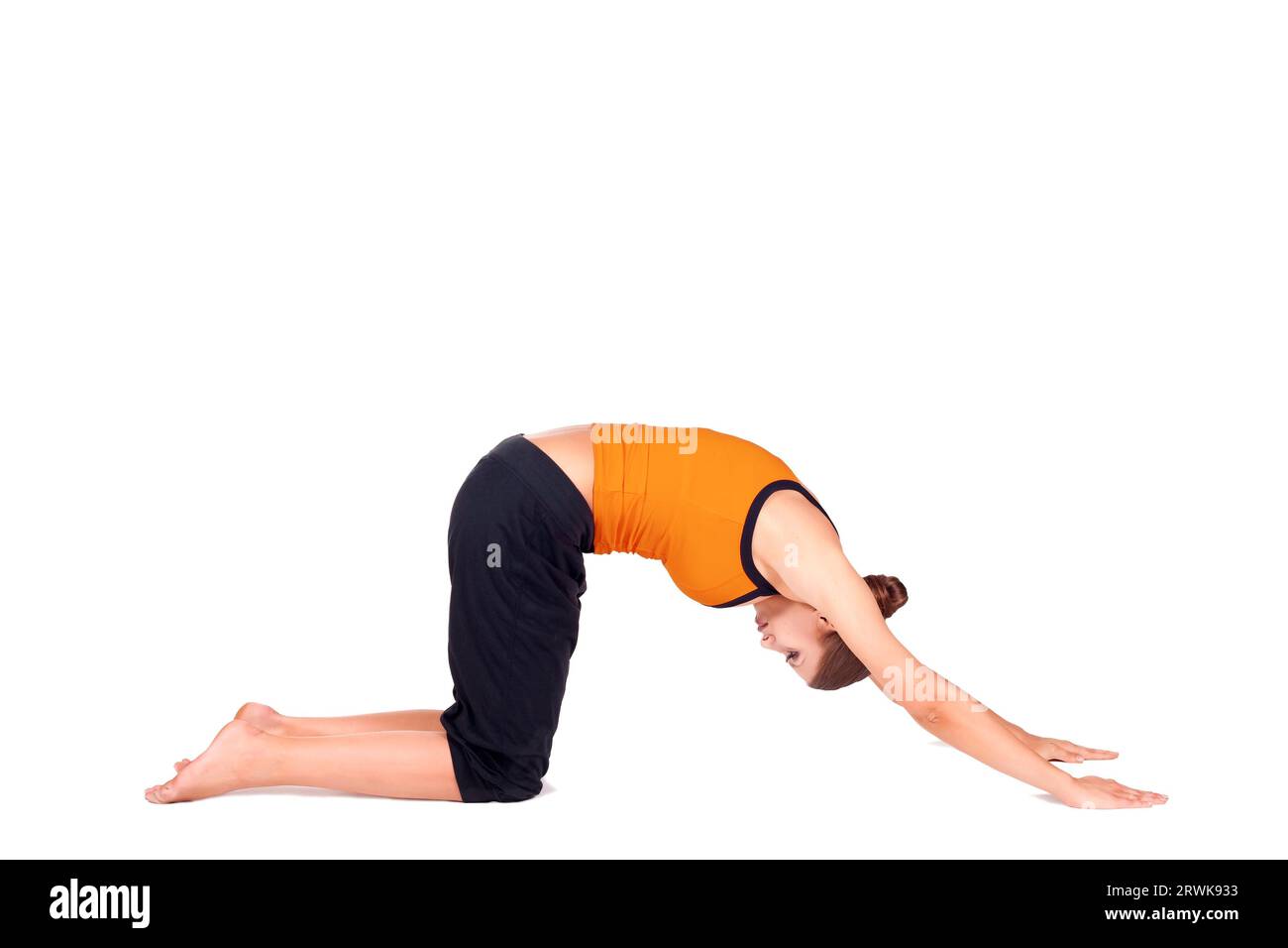 Fit young woman bowing on isolated white background Stock Photo - Alamy